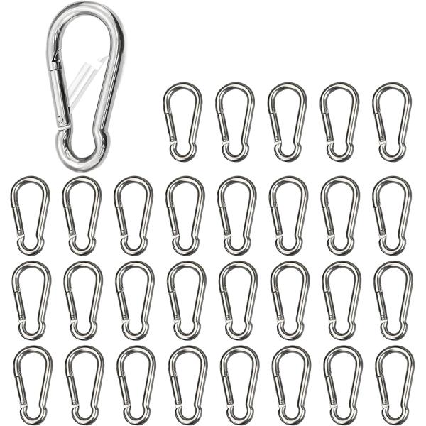 「多用途に使えるスプリング式カラビナ」 304ステンレス製のカラビナは、アウトドア・車内・DIY・ガーデニングなど、さまざまなシーンで活躍。スプリング付きで片手でも開閉しやすく、吊り下げや連結、小物整理に便利です。「全長5cm｜使いやすいサ...