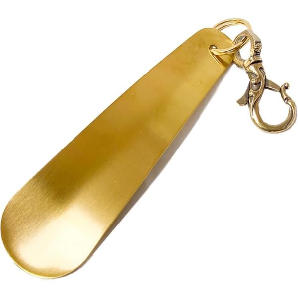 バリエーションコード : 2BU5SORQ42携帯して持ち運びやすい真鍮製の短ヘラ靴ベラになります。美しい真鍮製を使用し、キーホルダーとしても使えるフック付きカバン、バッグ、ジーンズに取付けなどもかっこよくできるのが可能になるアイテムgoo...