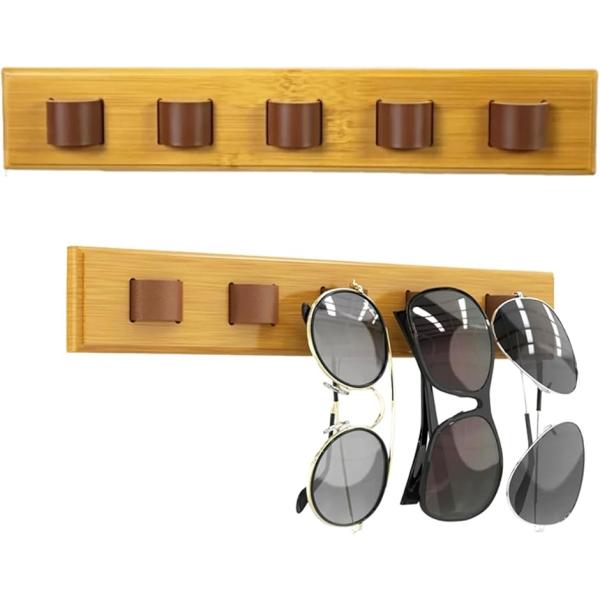 バリエーションコード : 2BUNG6W4N9壁に掛けて使うタイプのメガネ・サングラスホルダーです。ブラウン、ブラック、ホワイトの3色をご用意しました。お部屋の雰囲気やお好みに合わせてお選びいただけます。壁掛け式で場所を取らず、メガネやサン...