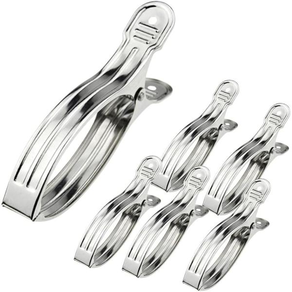 「風にも負けない超強力グリップ。」PreQruooの布団ばさみ（洗濯バサミ）は、幅広16cmの大型サイズで羽毛布団や毛布もがっちり固定。ステンレス製で錆びにくく、耐候性・耐久性に優れ、屋外干しやベランダ干しに最適。強力バネとクッション付きで...