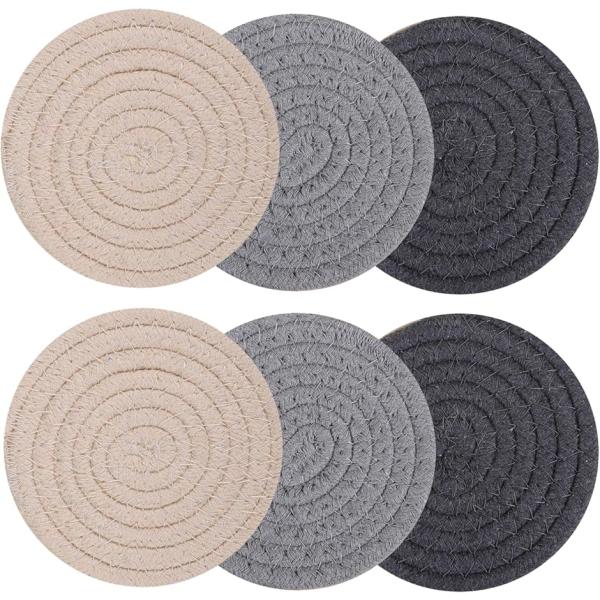 バリエーションコード : 2BUUTYLPYX「優れた吸水性＆速乾性」 おしゃれで実用的な布製コースターセット。高い吸水性で、テーブルを水滴からしっかり守ります。「しっかりとした耐熱仕様」 厚みがあるため熱いカップも安心して置ける耐熱仕様。...