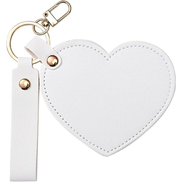 バリエーションコード : 2BUWF6OIVG「商品説明」持ち歩くだけで可愛さアップ。ハート型デザインのチャームミラーです。バッグやポーチに付けられるキーホルダータイプで、アクセサリー感覚で持ち運びが可能。開くと便利なミラー付きで、外出先で...