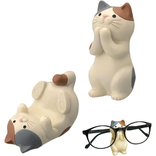 バリエーションコード : 2BUXUXKGF9オフィスで癒される猫の置物。まんまるな猫背ポーズとお願いポーズがかわいい、卓上のスマホスタンドとメガネ立ての2点セットです。使いたい時にさっと取れる＆かけやすいメガネスタンドはブルーライトカット...