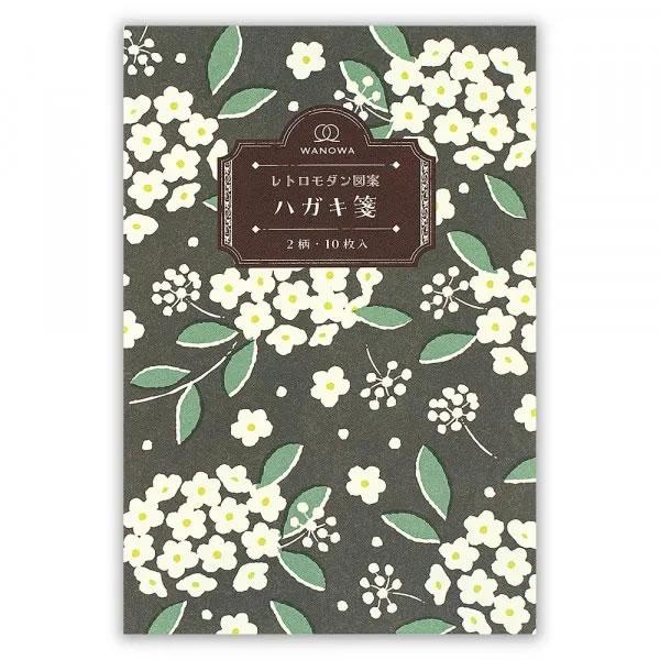 WANOWA　-レトロモダン-大正時代のレトロモダンな色彩や図案をイメージしたはがき箋です。白い花鞠をシックなカラーでデザインしました。レイアウトが異なる２柄がアソートで入っており、気分を変えて楽しめます。◇はがき：H148×W100mm ...
