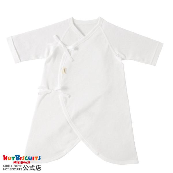 ミキハウス ホットビスケッツのコンビ肌着。＜出産準備アイテム＞ふんわり優しいフライス素材のコンビ肌着。一年中、お使いいただける素材です。白無地なのでセレモニードレスの下にも着用していただけます。やわらかく、吸水性・耐久性に優れた綿100％の...