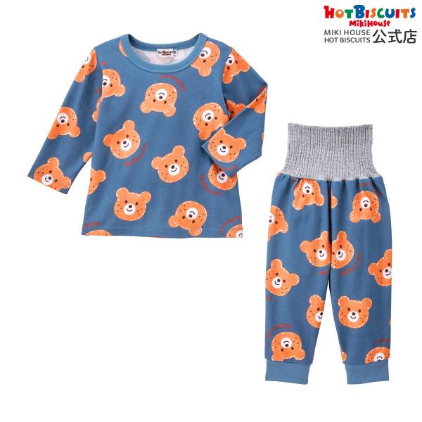 ミキハウス ホットビスケッツの総柄長袖パジャマ。ビーンズのお顔が総柄になったかわいいデザインのパジャマです。たくさんのフェイスプリントはインパクト大！おやすみタイムが楽しくなりますね。お着替えがスムーズにできるかぶりタイプ。おなかをしっかり...