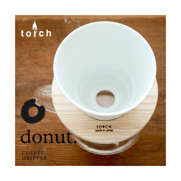 ブランド ：TORCH（トーチ）アイテム名 ：ドーナツドリッパーカラー ： 白、黒素材 ：磁器、天然木（ホワイトアッシュ材ウレタン塗装仕上げ）生産国 ：MADE IN JAPAN（磁器は美濃焼）*1人分のコーヒー120mlを12gの豆で1〜...