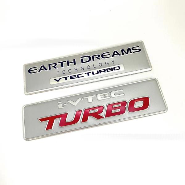 HONDA（ホンダ）の【i-VTEC TURBO】と【EARTH DREAMS（アースドリーム）】エンブレムとなります。厚さ1mmのアルミ製なので、ある程度曲げて貼ることも可能です。表面の文字部分はメッキ、シルバー部分は少しざら付いたマッド...