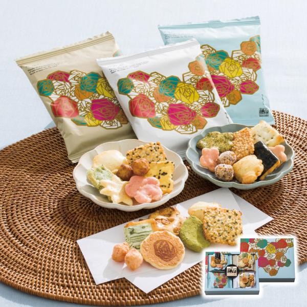 3種の食べきりのひとつつみにそれぞれ個性豊かなあられを詰合せました。パッケージデザインは、ステンドグラスをイメージした色彩豊かな花のモチーフは、日常を華やかに彩ります。爽やかな夏の味わいを加えた夏限定の詰合せです。箱サイズ：28.8×5.8...
