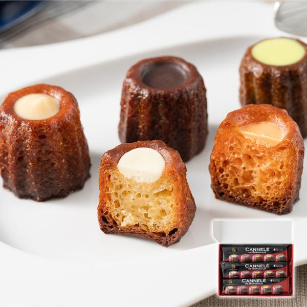 表面はカリッと中はもっちりとした伝統的な食感で人気のカヌレをプチサイズで5種類セットにしました。かわいい見た目で食べやすいサイズながら本格的な味わいをお楽しみいただけます。箱サイズ(cm)：25×17.5×4cm現品・内容・サイズ・材質：バ...