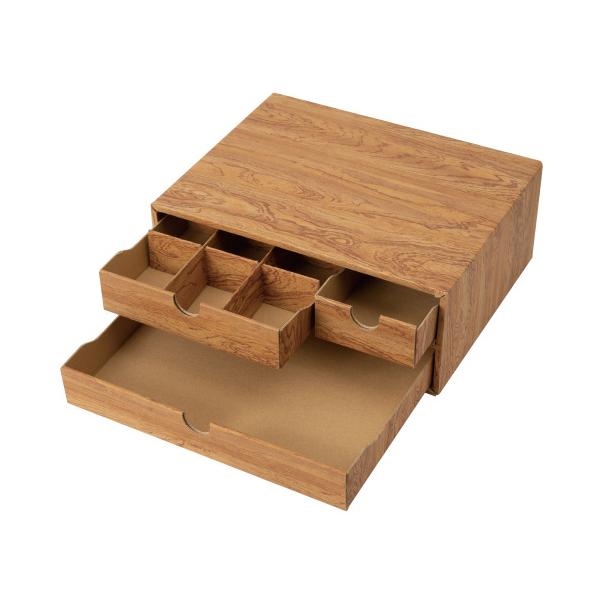 段ボール製のマルチBOXです。天面にはFAXも置けるように、引き出し周りに強化段ボールを内蔵し紙素材だけど強くて安心な仕様に。上段には２つの引き出しがあり、一つは仕切り板付きで細かな備品（巻尺やノリや印鑑）を収納できます。もう片側の引き出し...