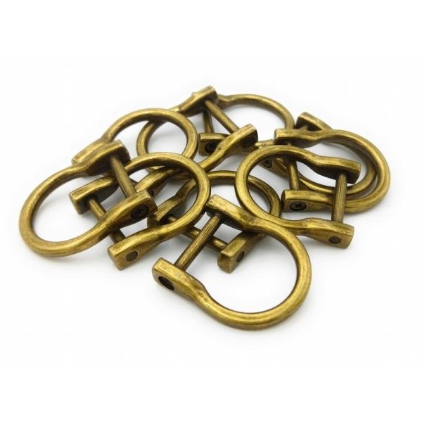 ■説明<br> ネジ式のDカン10個セットです。<br> <br> ■仕様<br> 直径：約19mm<br> セット内容：10個<br> カラー：アンティーク<b...