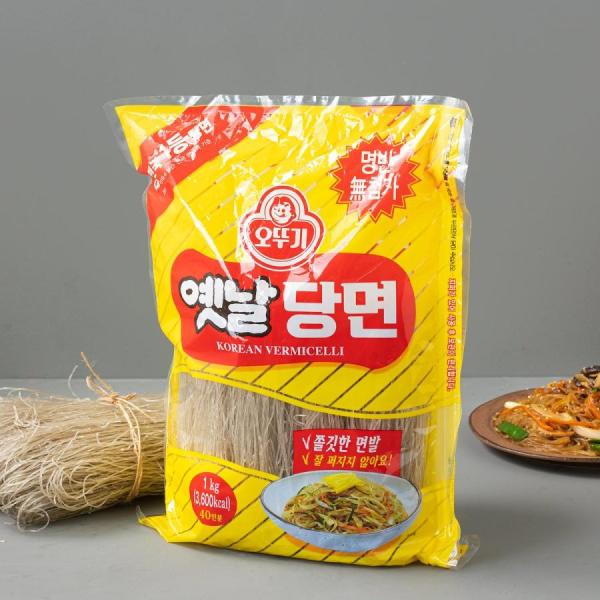 #商品の特徴 : POINTオットギの韓国春雨（ダンミョン）は、1kgの大容量であなたの食卓を華やかに彩ります。これらの春雨は、コシのある食感と豊かな風味が特徴で、家庭料理から本格的な韓国料理まで幅広くご利用いただけます。特にチャプチェには...