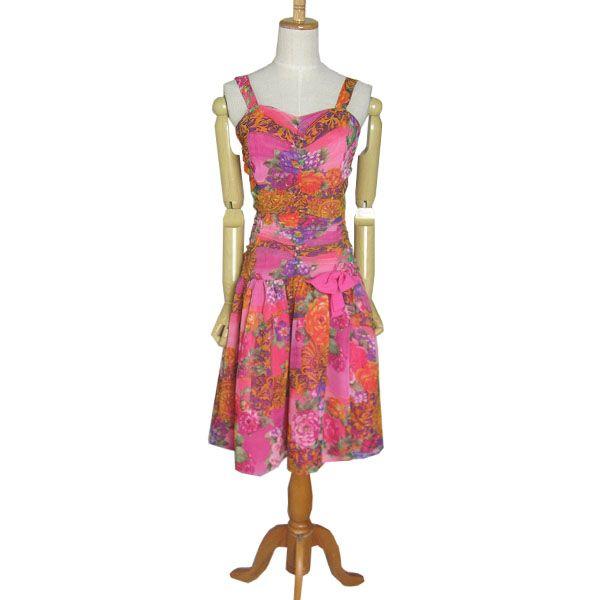 ヨーロッパから入荷。花柄のパーティードレス。●ブランド● CHANTAL ROSNER●製造国●フランス●表記サイズ● 不明(目安:S)●採寸●肩紐長さ　約32.5cm着丈(背中から)　約78.0cm身幅(後ゴムの為最小)　約32.0cm〜...