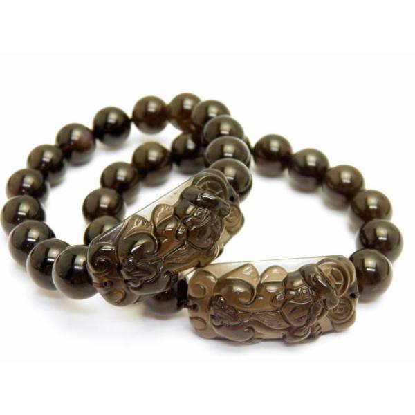 レインボーオブシディアン 貔貅【ヒキュウ】ブレスレット 1本売り【黒曜石】天然石 パワーストーン透明感もあるレインボーオブシディアンにヒキュウを掘り込んだ珍しいブレスレットです。財運のお守りと伝承され、縁起物として人気度の高いヒキュウです。...