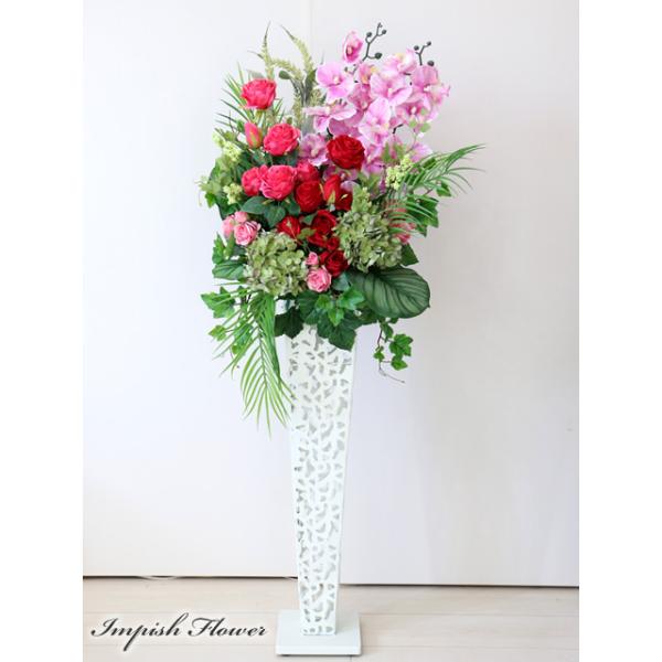 アーティフィシャルフラワー 造花 使用■サイズ:幅:52 奥行:30 高さ:122 (cm) ■主な使用造花：バラ・胡蝶蘭高級造花を使用したスタンド型アレンジメントです。インテリアとしてはもちろん贈り物としてもおすすめです。用途例：誕生日、...