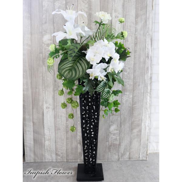 アーティフィシャルフラワー 造花 使用■サイズ:幅:52 奥行:34 高さ:106 (cm) ■主な使用造花：胡蝶蘭・カサブランカ高級造花を使用したスタンド型アレンジメントです。インテリアとしてはもちろん贈り物としてもおすすめです。用途例：...
