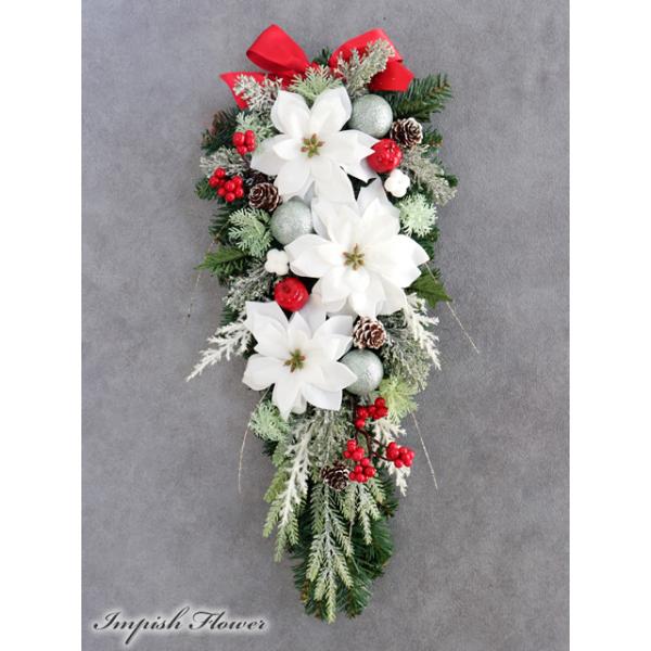 アーティフィシャルフラワー（造花）使用■サイズ: 幅:23 奥行き:10 高さ:52 (cm) ■主な使用造花：ポインセチアインテリアとしてはもちろん御祝い用にもぴったりの豪華な造花を使った壁掛けリースのアレンジメント用途例：誕生日、結婚祝...