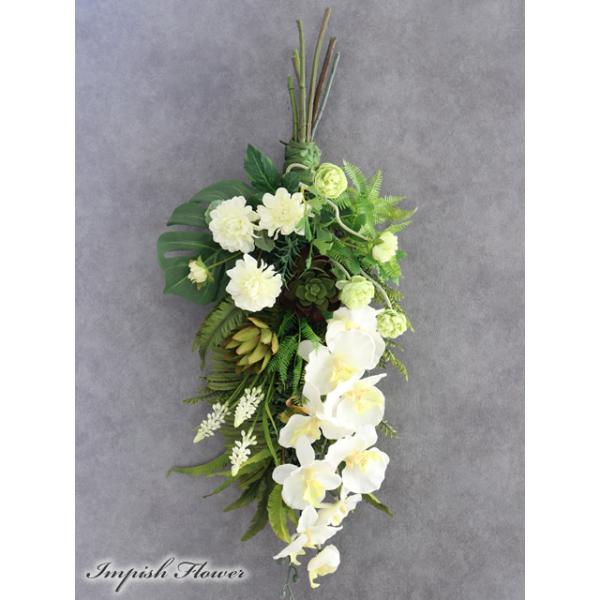 アーティフィシャルフラワー（造花）使用■サイズ: 幅:35 奥行き:19 高さ:82 (cm) ■主な使用造花：胡蝶蘭インテリアとしてはもちろん御祝い用にもぴったりの豪華な造花を使った壁掛けリースのアレンジメント用途例：誕生日、結婚祝い、記...