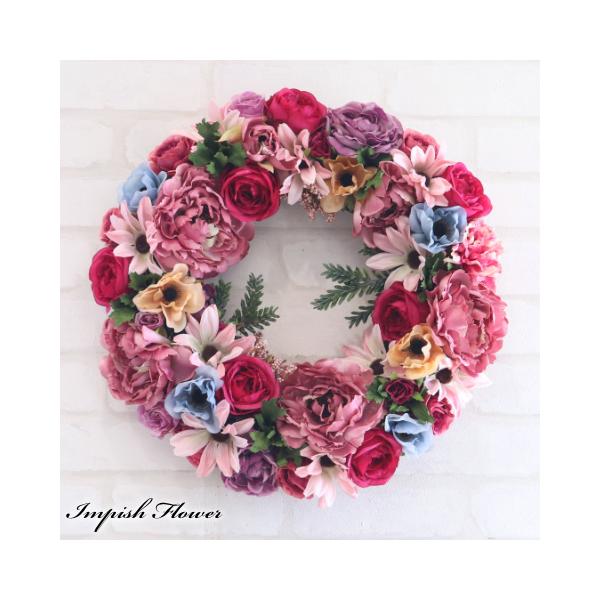 アーティフィシャルフラワー 造花 使用■アレンジサイズ: 直径:42 奥行き:9 (cm) ■主な使用造花：バラ・ピオニーインテリアとしてはもちろん御祝い用にもぴったりの豪華な造花を使った壁掛けリースのアレンジメント用途例：誕生日、結婚祝い...