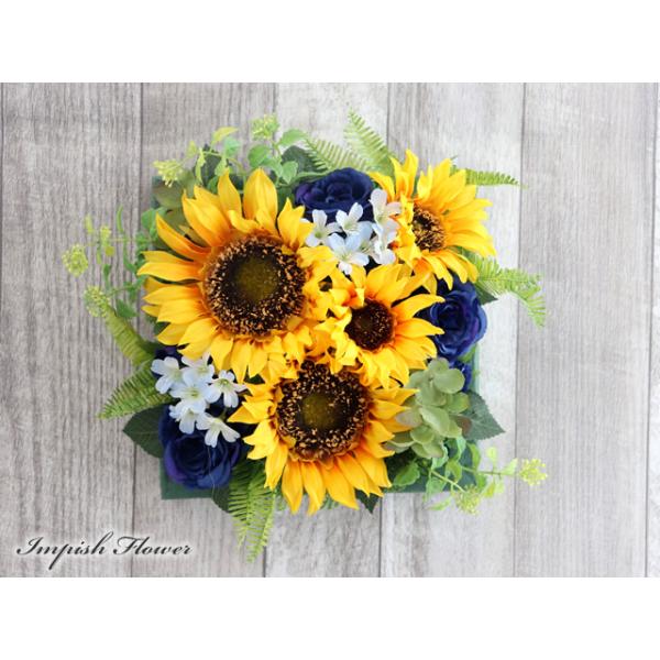アーティフィシャルフラワー 高級造花 使用■サイズ: 幅:26 奥行き:10 高さ:26 (cm) ■主な使用造花：ひまわり・バラインテリアとしてはもちろん御祝い用にもぴったりの豪華な造花を使ったリースのアレンジメント用途例：誕生日、結婚祝...
