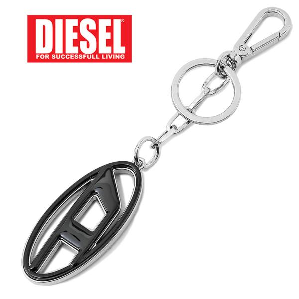 【ディーゼル DIESEL】キーチャームアイコンのオーバルDを落とし込んだキーチャーム。きらりとクールな表情が魅力のメタル＆レジン。■商品番号：X10293-P8097 CAGE-D LAYER■素材：組織: セルロース系樹脂、亜鉛、鉄 ■...