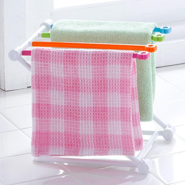 サイズ/使用時：約幅15.5×奥行20.5×高さ17.6cm収納時：約幅15.5×奥行25.5×高さ2cm内容量/1個材質/ABS樹脂生産国/日本製耐熱温度/80度●台ふきんや食器用の布巾をまとめて干せるスタンドです。●保存袋やペットボトル...