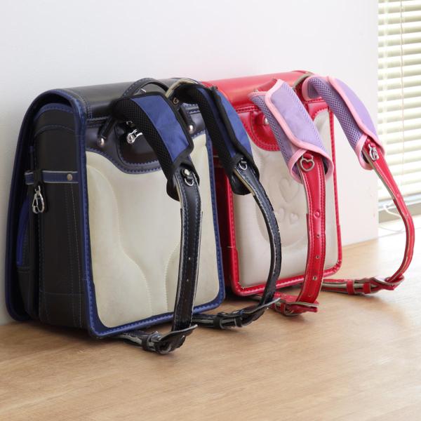 サイズ/約幅6.5×奥行3×高さ22cm包装サイズ：約幅17×奥行3×高さ27cm重量/約95g内容量/1個材質/ポリエステル、PVC、ナイロン種類/パープル、ネイビー生産国/中国製洗濯/手洗いのみ可能●ランドセルに取り付けて肩への負担を軽...