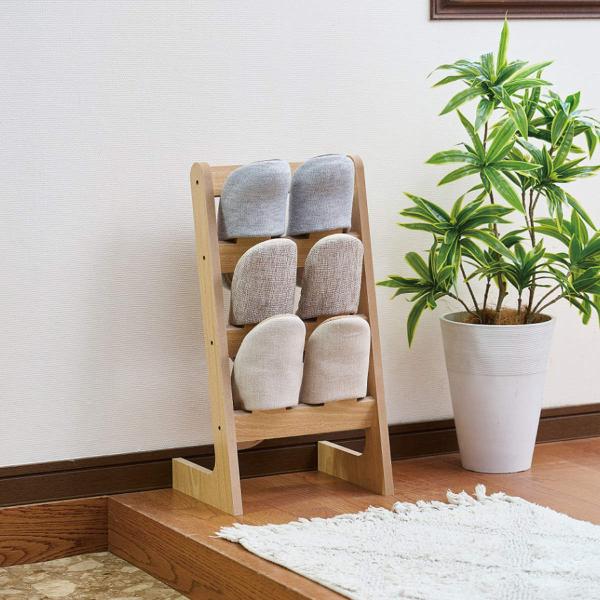 サイズ/約幅29×奥行23×高さ54.5cm重量/約1.55kg内容量/1台材質/ＭＤＦ（表面加工：メラミン）生産国/中国製組立状態/お客様組立品●温かみを感じられる木製のスリッパラックです。●大型スリッパも含め、3足収納が可能です。●出し...