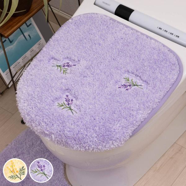 サイズ/洗浄暖房型・普通型（O型・U型）兼用内容量/1枚材質/ポリエステル100％種類/イエロー、ラベンダー生産国/インドネシア製洗濯/洗濯機使用可能乾燥機/使用不可●花の刺繍が可愛らしいトイレ蓋カバーです。●素朴で優しい雰囲気なミモザ柄と...