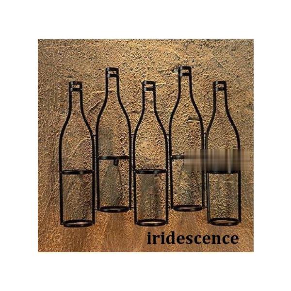 とってもオシャレなボトルモチーフのワインホルダーです。ボトル型の中にお好きなワインボトルを飾るなんてとってもユニークですね。殺風景な壁に掛けるだけで一気にオシャレ感がアップしますよ。壁にかけずに机の上に置いてお使い頂くことも出来ます。ご家庭...