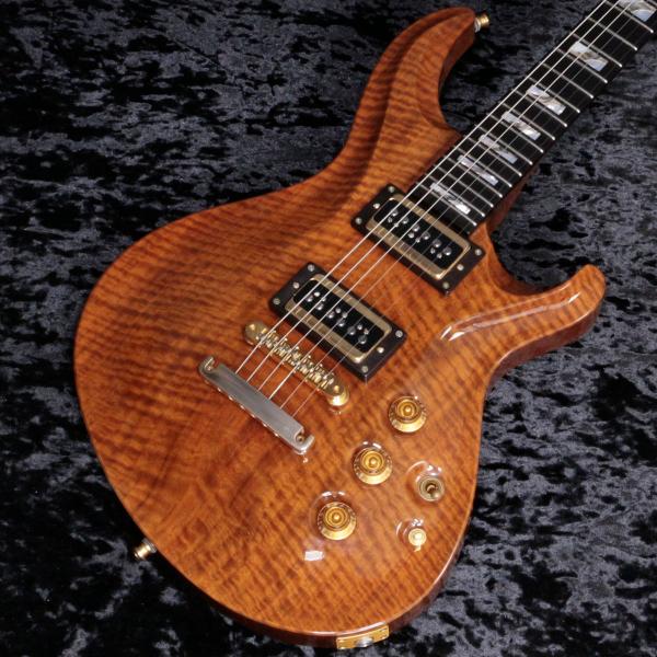 ESP Exhibition LimitedシリーズMYSTIQUE-CTMの中古が入荷しました！下記スペックになります。BODY:(Top) Flame Walnut, (Back) Walnut (Chambered)NECK:Waln...