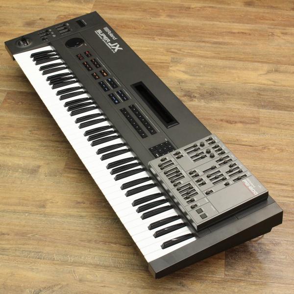 Roland JX-10 SUPER JX　1986年発売、ローランドのDCOアナログシンセ、SUPER JX。ベロシティ・アフタータッチ付き76鍵、24DCO、12音ポリ。JX-8Pが2台分のスペックを誇ります。D-50が発売される前のロ...