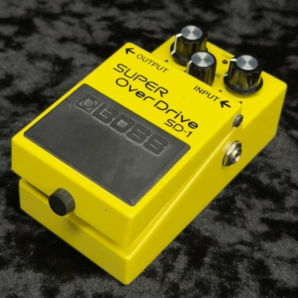 BOSS/SD-1 Super Over Driveの中古が入荷いたしました!発売以来ロングセラーを続ける”SUPEROVERDRIVE”。原音の倍音構成を保ち歪んでくれるのでギターの持ち味を最大限に引き出したドライブサウンドが得られます。...