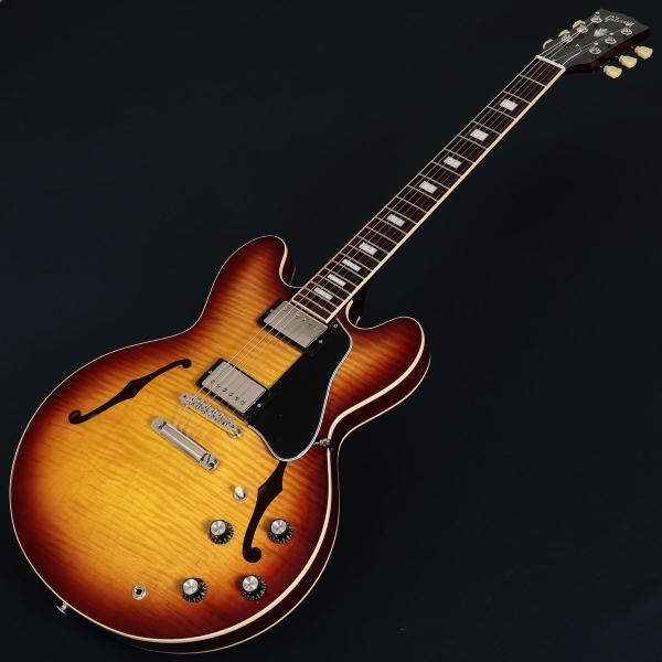USA ナッシュビル工場生産、フィギャドTopのES-335!ギブソンES-335フィガードは、ルックスと機能性の双方を完璧に兼ね備えたギターです。美しいAAAフィギュアド・メイプル/ポプラ/メイプルのラミネート材をボディトップ、バックに使...