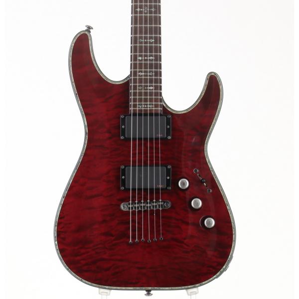 アーチトップ・ボディに裏通しストリングスルーボディ構造でへヴィサウンドに対応したヘルレイザー。シェクターのヘルレイザー・C-1・AD-C-1-HR、2009年製です。キルトトップのマホガニーボディ、マホガニーネック、ローズ指板にはゴシック・...