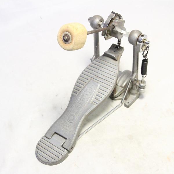 1980年代のタマカムコペダルのオリジナル当時タマがカムコのパテントを継承し生産していた伝説のモデル国産のDP120タマカムコペダルです。ギヤ式の真円スプロケットなどカムコならではの機構を受け継いでおり、ナチュラルで軽快な踏み心地は多くのド...