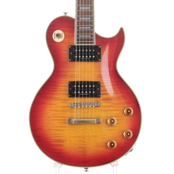 アリアプロII(2)のProElectric・PE-DLX、1997年製です。Ariaが世界に誇るオリジナル・シェイプ、大胆なヒールレスジョイントやアーチトップが特徴のPEシリーズ。キルトメイプル・メイプルトップ/アルダー・バック、マホガニ...