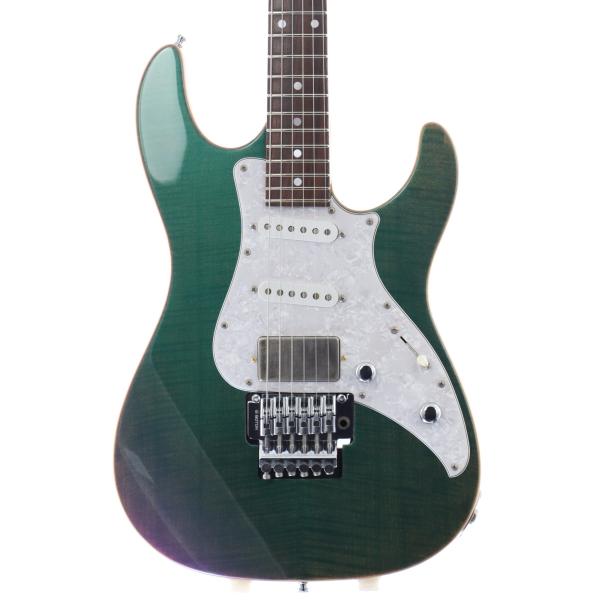 Tom Holmes搭載、実戦仕様へ進化したVarita Custom Guitar Soltar。鮮やかなカメレオンカラーと美しいフレイムメイプルトップが目を惹くVarita Custom Guitar Soltar。アルダーバックとの組...