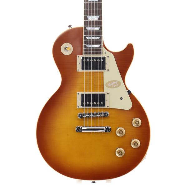 往年の“59バースト”を、現代的な精度と現実的な価格帯で再現したモデル。Gibson Custom監修のもと開発された本機は、単なるルックス再現に留まらず、構造・電装・パーツに至るまで徹底的にヴィンテージ仕様を踏襲。マホガニーボディにメイプ...