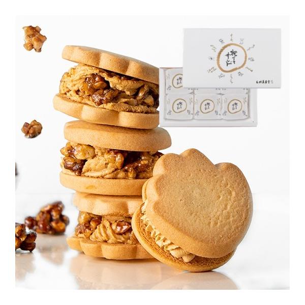 博多の祭りやお祝いの席に欠かせない風習「博多手一本」から誕生しました。手一本を連想する  かわいい手形のクッキーでほろ苦いキャラメルクリームとキャラメリゼしたクルミをサンドした、キャラメルサンドです。キャラメルは、焦げすぎないよう職人が丁寧...