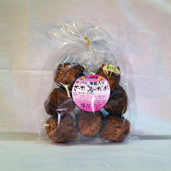 沖縄　石垣島から直送の黒糖さーたーあんだーぎーです。沖縄ドーナッツとして知られる伝統郷土菓子、さーたあんだーぎーを沖縄から直送します。本品は保存料・着色料・化学調味料を使用しておりません。名称 さーたーあんだーぎー（揚げ菓子）原材料 小麦粉...