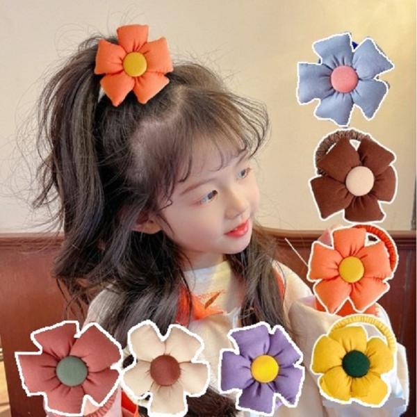 商品発送元：BAOBAOキッズ・ベビー・マタニティ素材：綿　ポリエステル※キッズ立体お花のカラフルヘアゴム（ヘアアクセサリー）※大きめのお花がポイント、さらに華やかに演出してくれる！※お団子ちゃんやハーフアップ等、どんなヘアスタイルでも可愛...