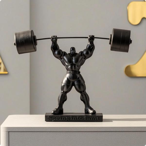 【製品概要】: 力強いリフティングポーズをとる筋肉質なボディビルダーフィギュアです。バーベルを頭上または肩の高さに掲げた圧巻的な存在感を放つデザインで、空間に力強いアクセントを加えます。【主な機能】: デスクや棚、受付、ジムのフロントなどに...