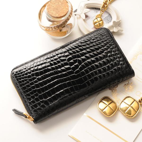 重量：約220g≪単位cm≫【サイズ】 横幅21/縦幅11/厚み3【素材】表側：スモールクロコダイル(イリエワニ)内装：スモールクロコダイル、パイソン、羊革、生地、合皮(内側側面と紙幣入れ内部に羊革、ワイドポケット内部に合皮、カードホルダー...