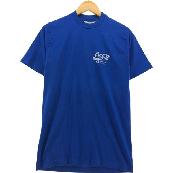 【コンディション】ランク：C【サイズ】着用感：メンズS表記サイズ：S/P着丈：70cm身幅：46.5cm肩幅：39cm袖丈：22cm【商品詳細】商品名：古着 90年代 Monograms unlimited COCA-COLA コカコーラ ...