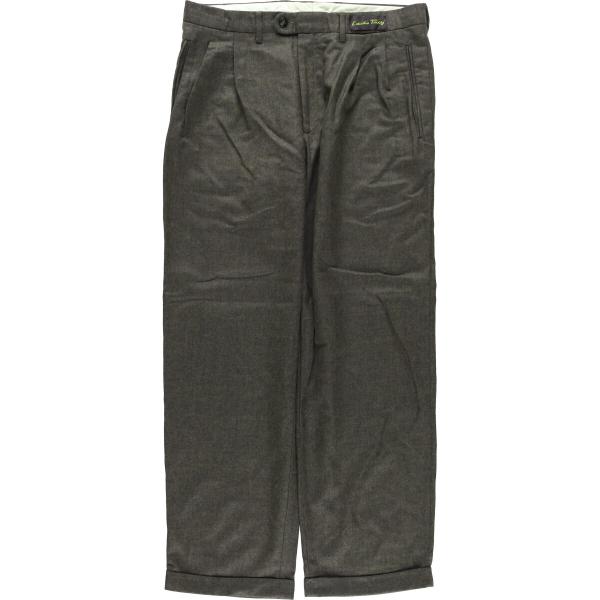 【コンディション】ランク：B【サイズ】着用感：メンズw34表記サイズ：44ウエスト：86cm股上：27cm股下：73.5cmもも周り：68cm裾周り：42cm【商品詳細】商品名：古着 Emidio Tucci ツータック ウールパンツ スラ...