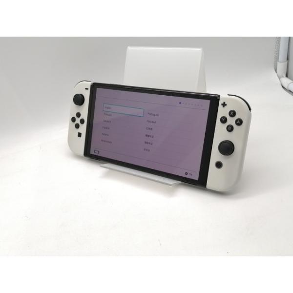 ■分類：据置ゲーム機■ランク：ランクB■メーカー：Nintendo■製造番号：XTJ50409276216■備考：状態：画面にスレ、外装にキズ、ジョイコンスティック部に軽度摩耗 付属品：switchドック、ACアダプタ、グリップ、Joy-C...