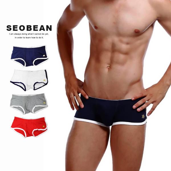 白のパイピングですっきりシルエットのスーパーローライズな ボクサーパンツ。ゴールドカラーのフライバグの刺繍がお洒落なアクセントに。 ほどよい立体感のフロントポーチでセクシーかつスタイリッシュなシルエット。 後ろ姿もかっこいいプリケツにキマる...