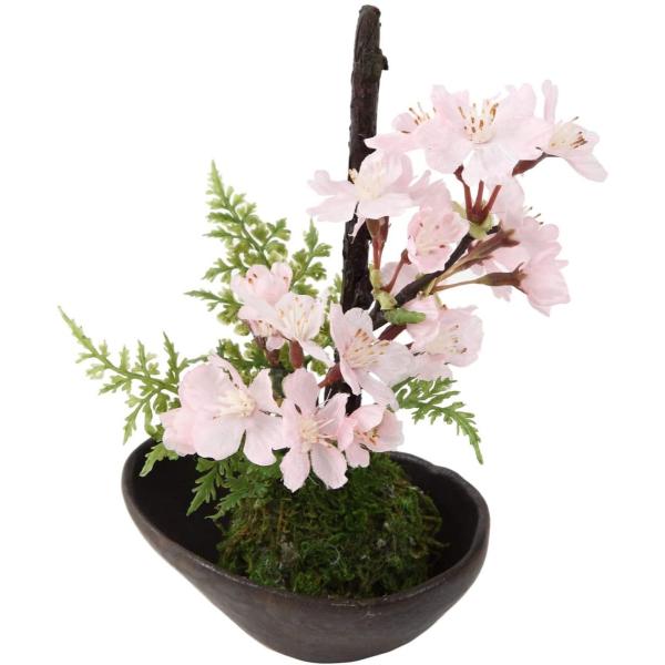 生花と見違えるようなクオリティーの高い高級な造花を使用した『花雅シリーズ』 見ているだけで何だかホッとする定番の苔玉デザイン。 枯れたりし萎れたりしないので、日々のお手入れや水替えの心配もなく、花粉や香りが無いので、アレルギーの方も安心です...